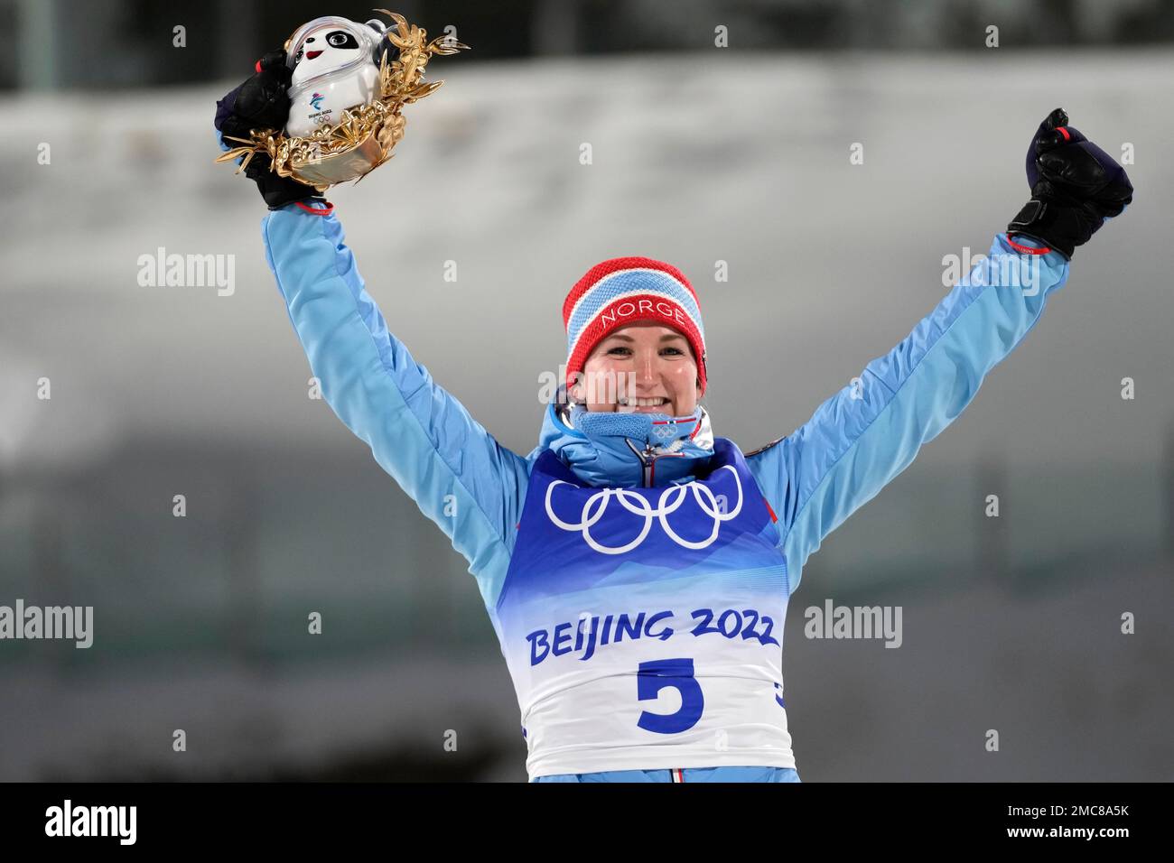 Marte Olsbu Roeiseland of Norway celebrates during a venue ceremony ...