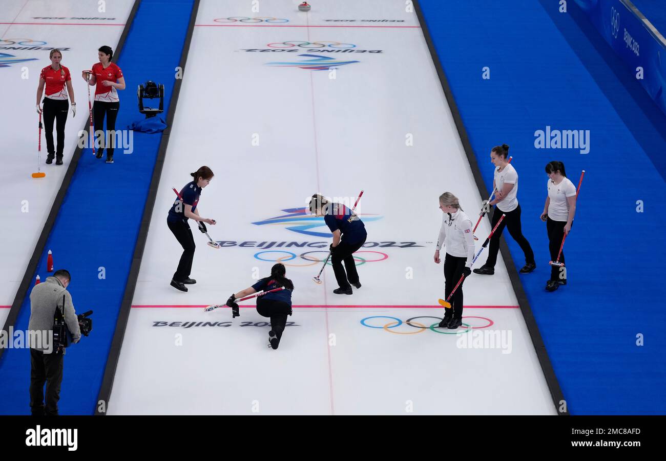 South Korea's Kim Kyeong-ae, throws a rock, during the women's curling ...