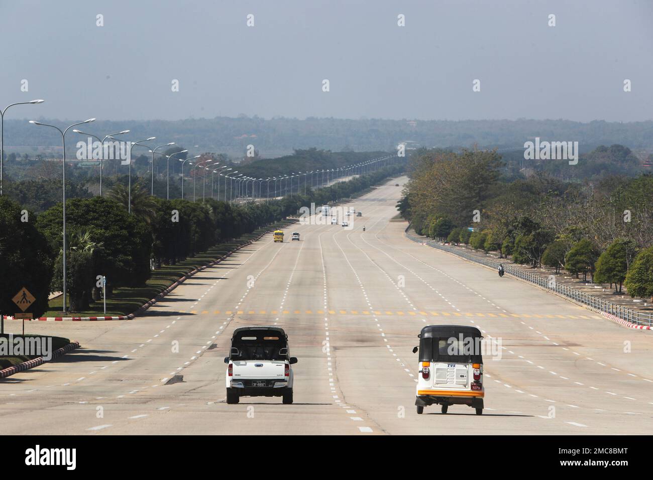 Vehicles make their ways along the massive multi-lane highway, Friday ...