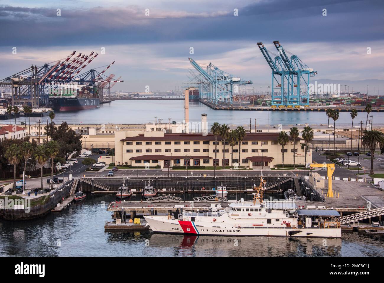 A US Coast Guard cutter is tied to the dock in the busiest container ...