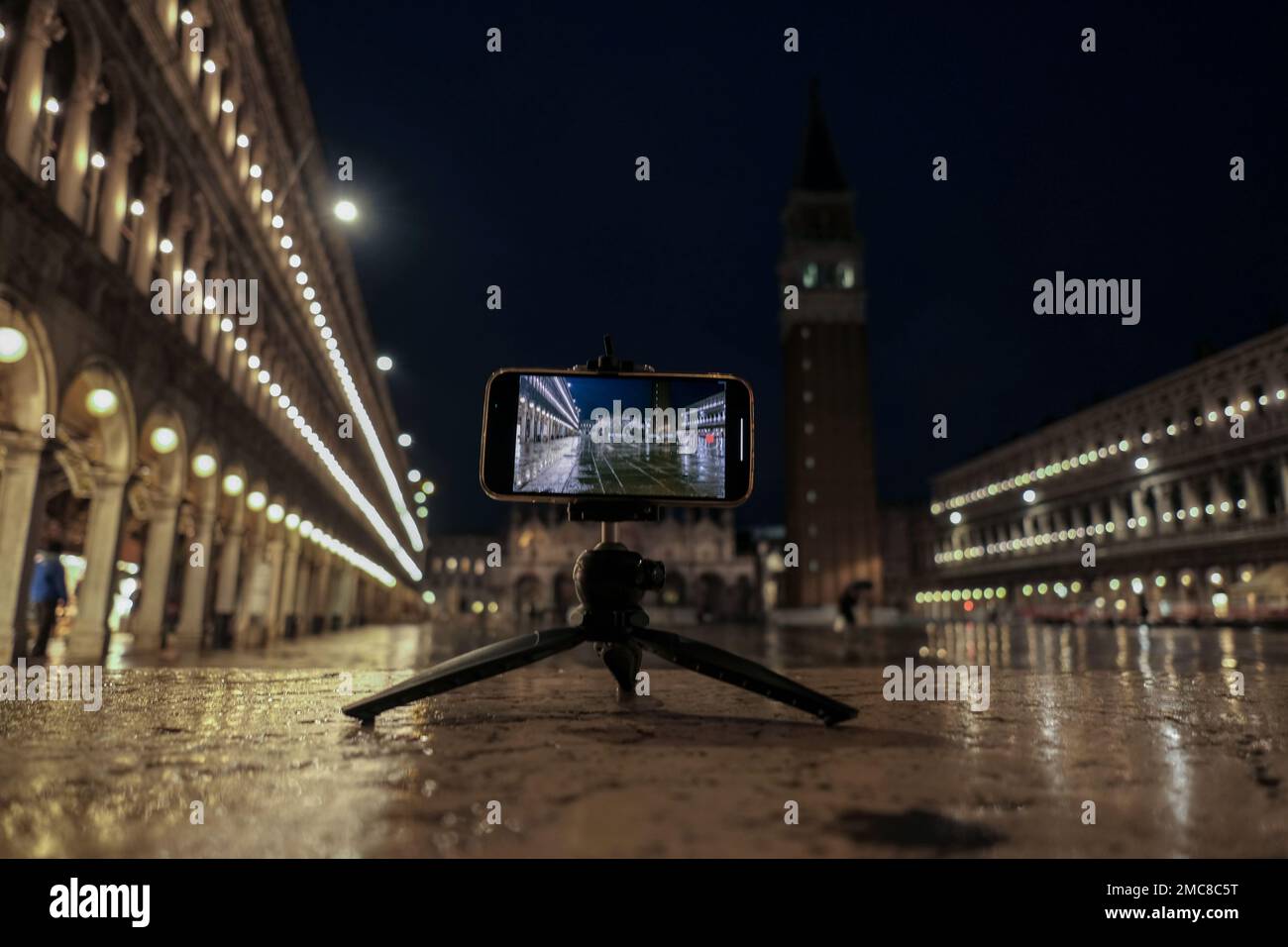 A view of St. Mark's Square flooded during seasonal high tide in Venice ...