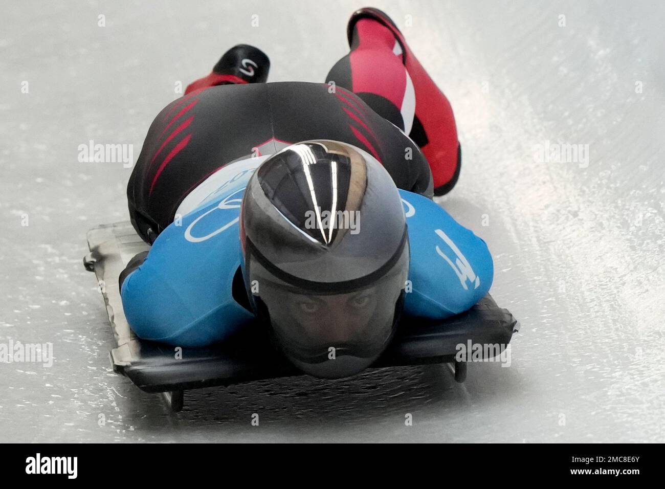 Janine Flock, of Austria, slides during the women's skeleton run 1 at ...