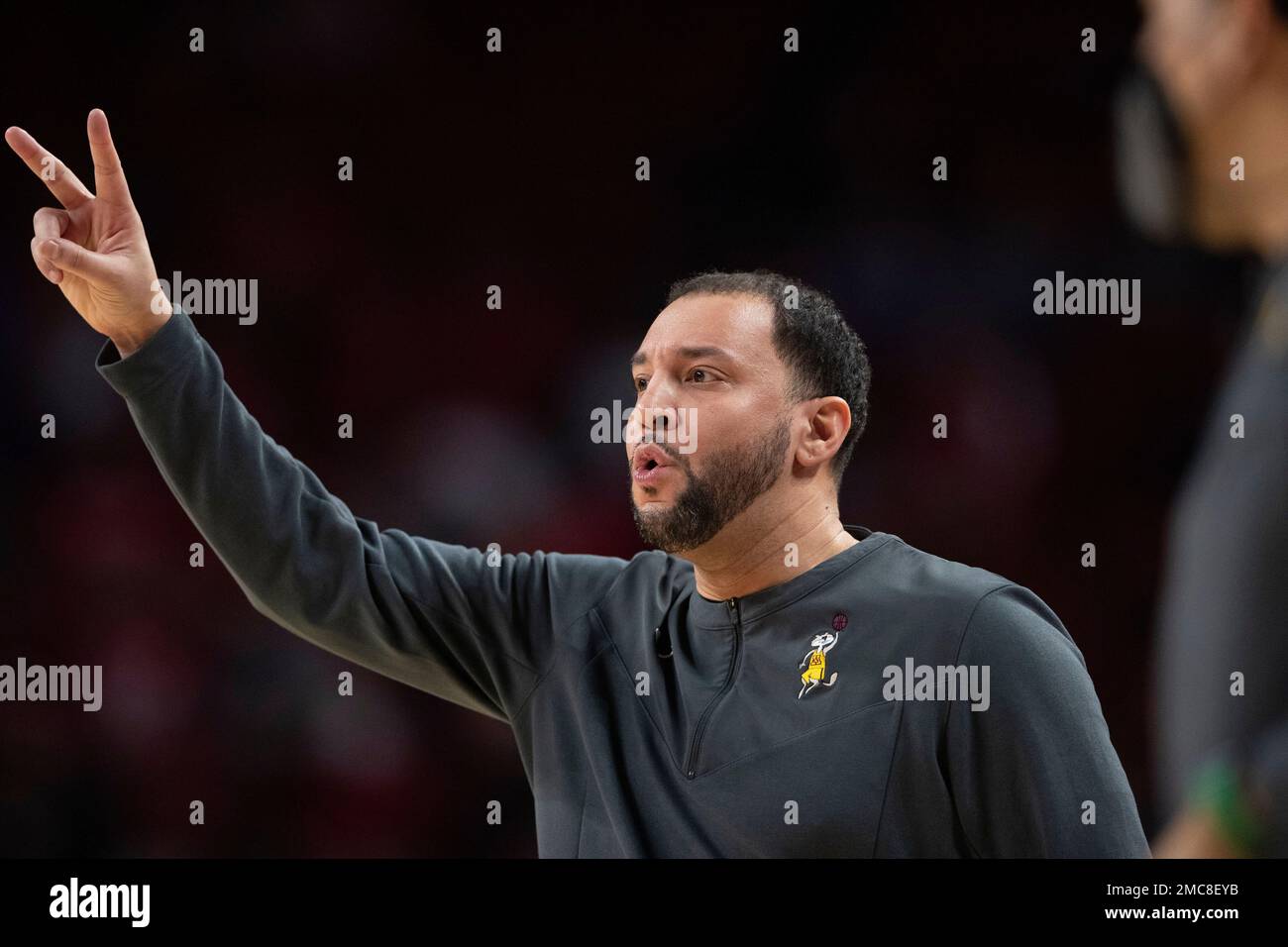 Minnesota head coach Ben Johnson calls plays as his team plays against ...