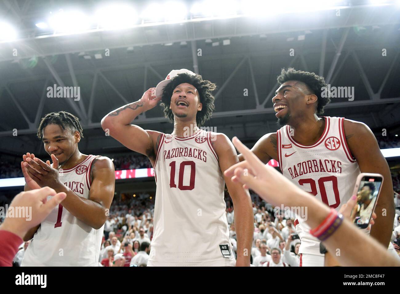 From left, Arkansas players JD Notae, Jaylin Williams and Kamani ...