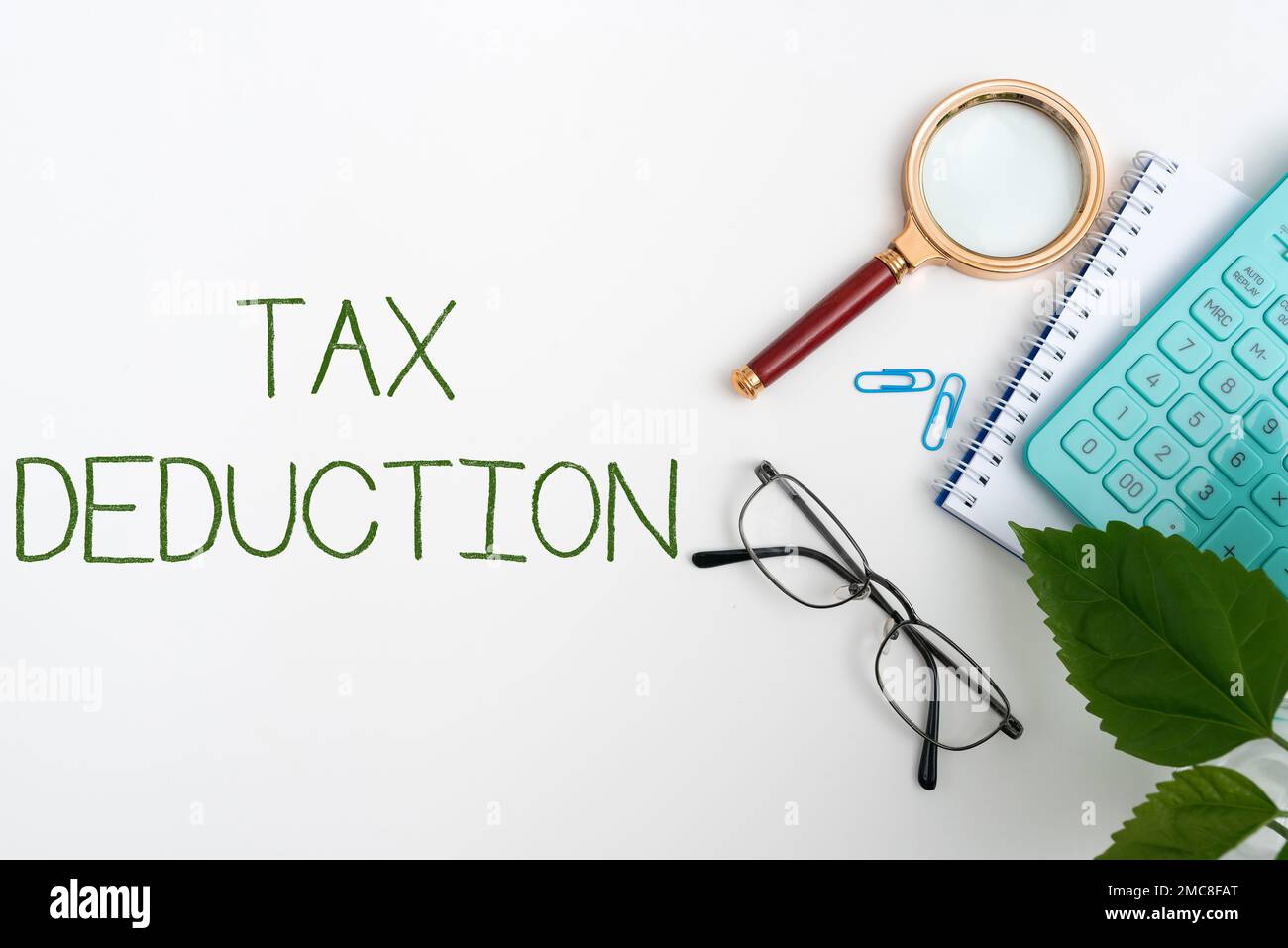 Hand writing sign Tax Deduction. Business showcase amount subtracted ...
