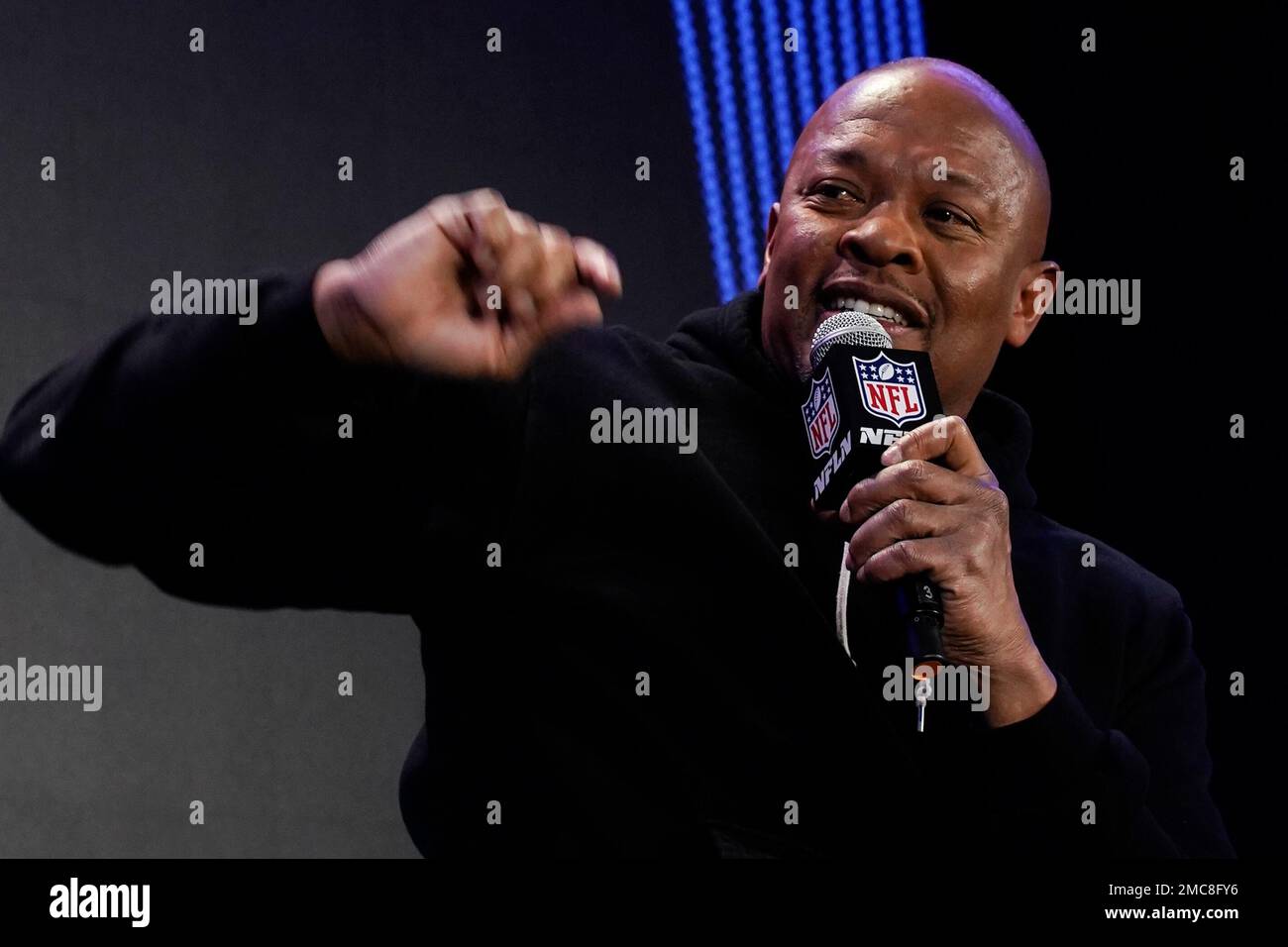 Dr. Dre answers a question during a news conference for the Super Bowl ...