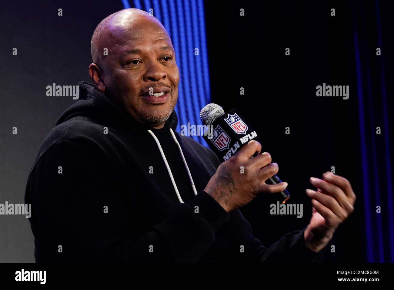 Dr. Dre answers a question during a news conference for the Super Bowl ...