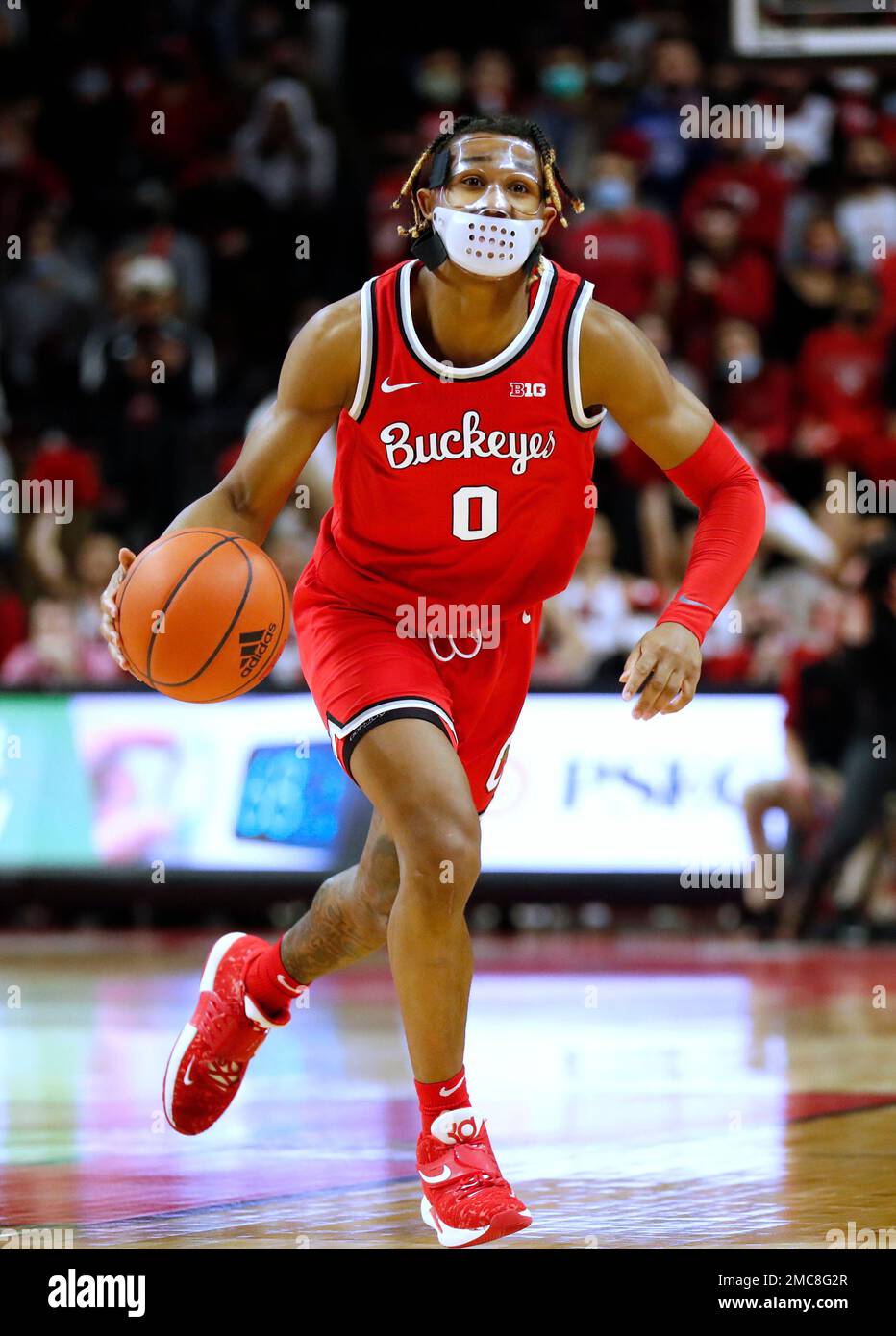 Ohio State guard Meechie Johnson Jr. (0) dribbles the ball against ...