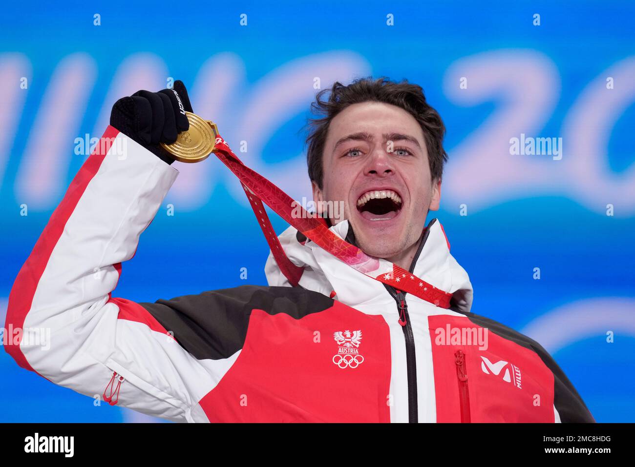 Alessandro Haemmerle of Austria shows off his gold medal during a medal ...