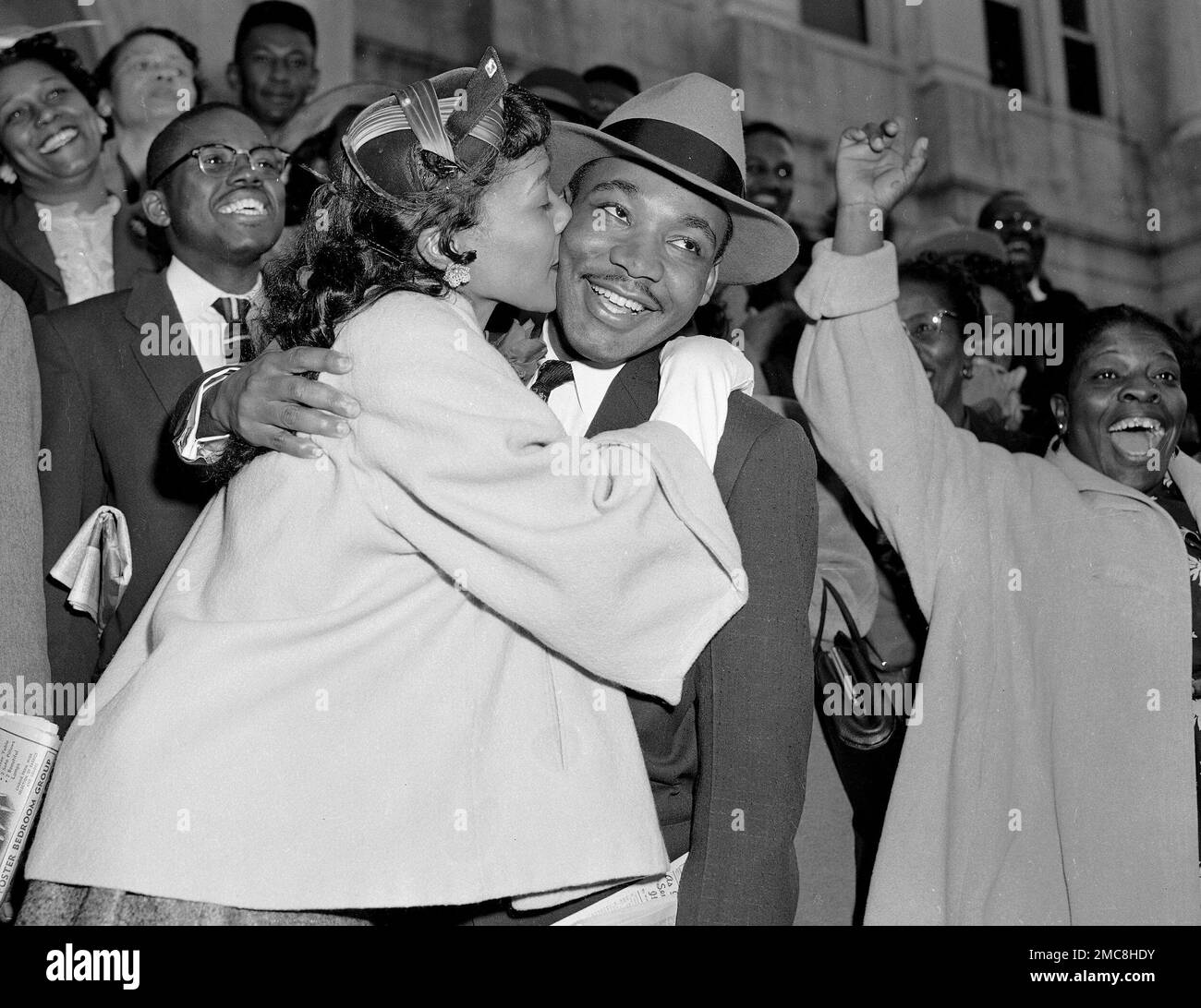 FILE The Rev. Martin Luther King Jr. is welcomed with a kiss by his ...