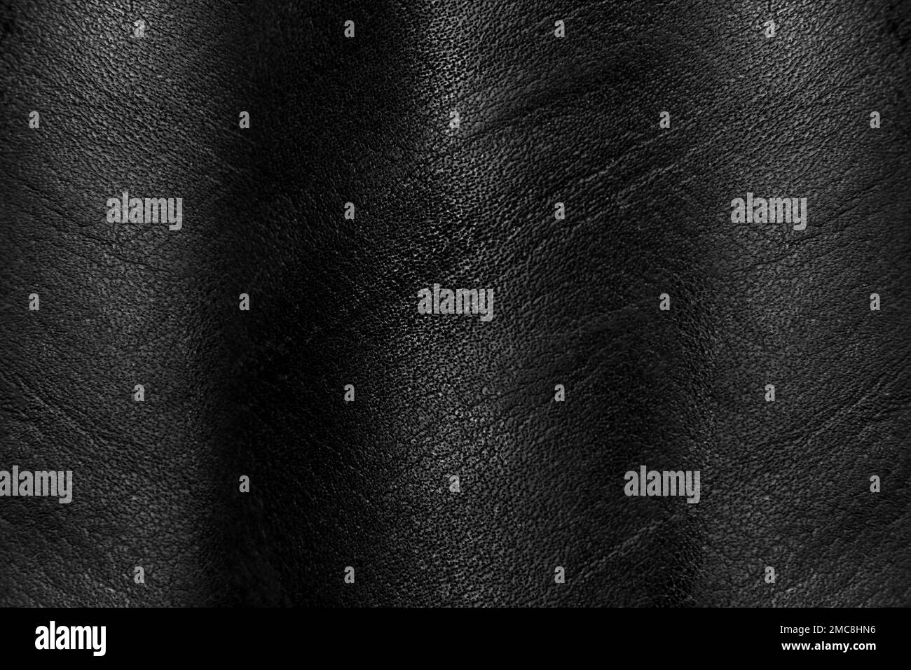 Black leather texture. Abstract background of dark leather with small ...