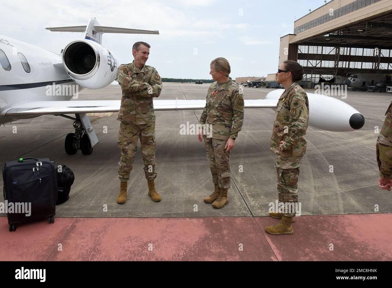 Lt. Gen. Tom Miller, Air Force Sustainment Center commander, is greeted ...