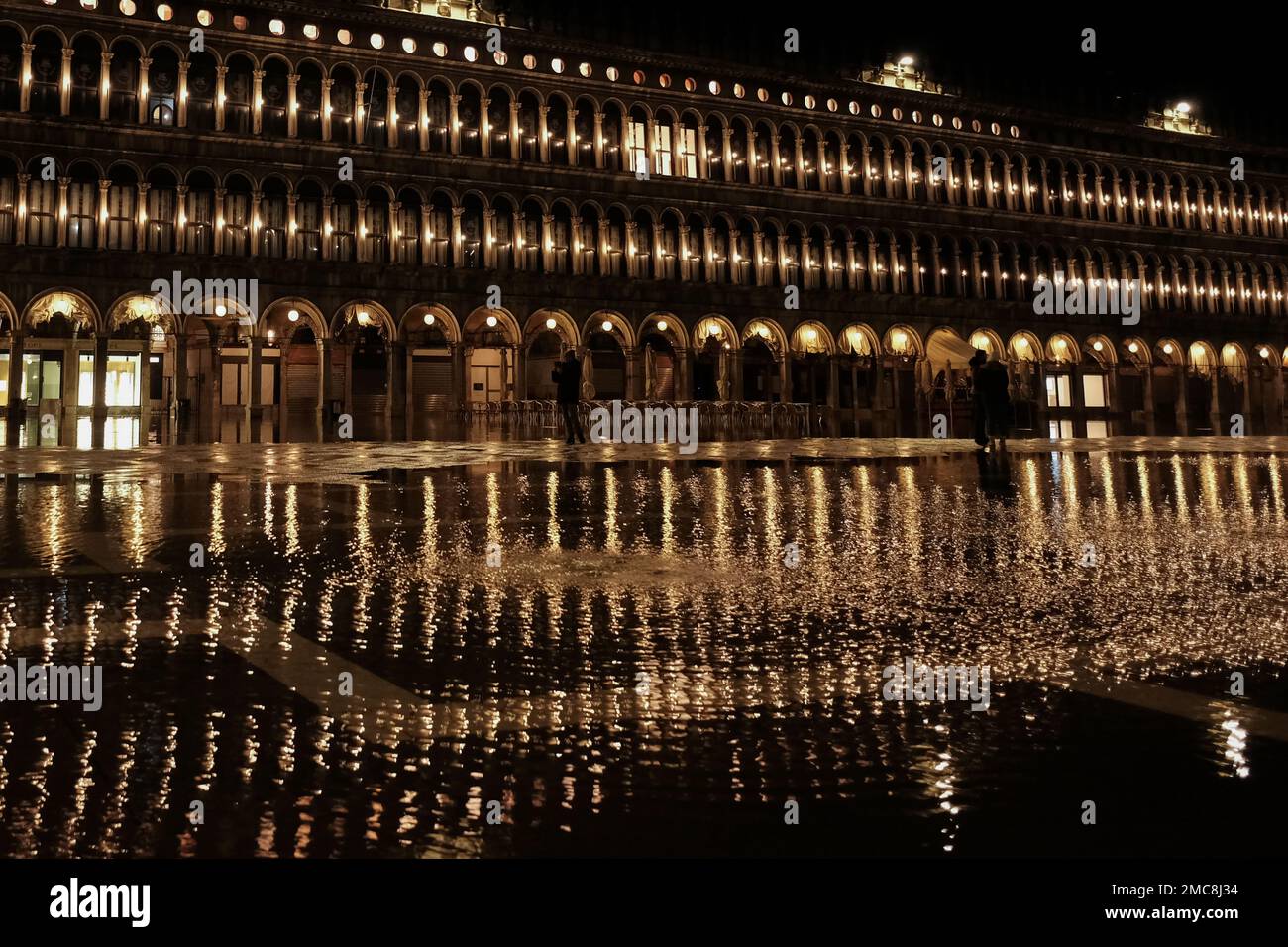 A view of St. Mark's Square flooded during seasonal high tide in Venice ...