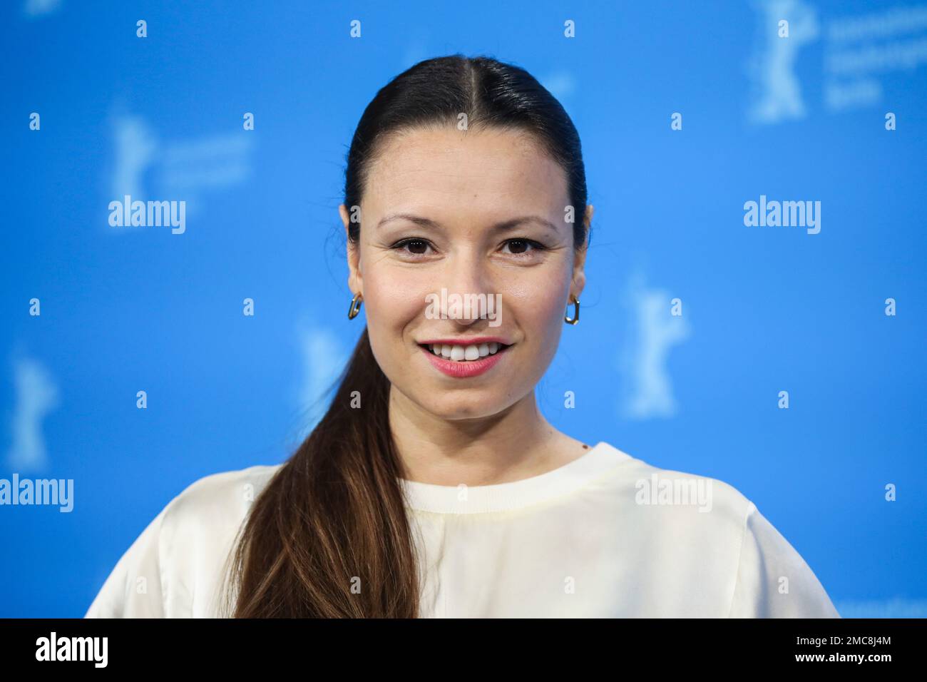 Jury member Anne Zohra Berrached poses for photographers at the photo ...