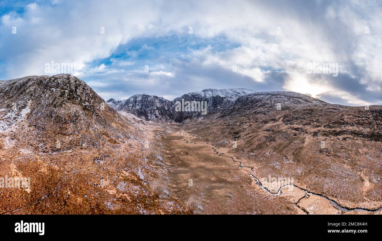 Aerial view of Poisen Glen next to Mount Errigal, the highest mountain ...