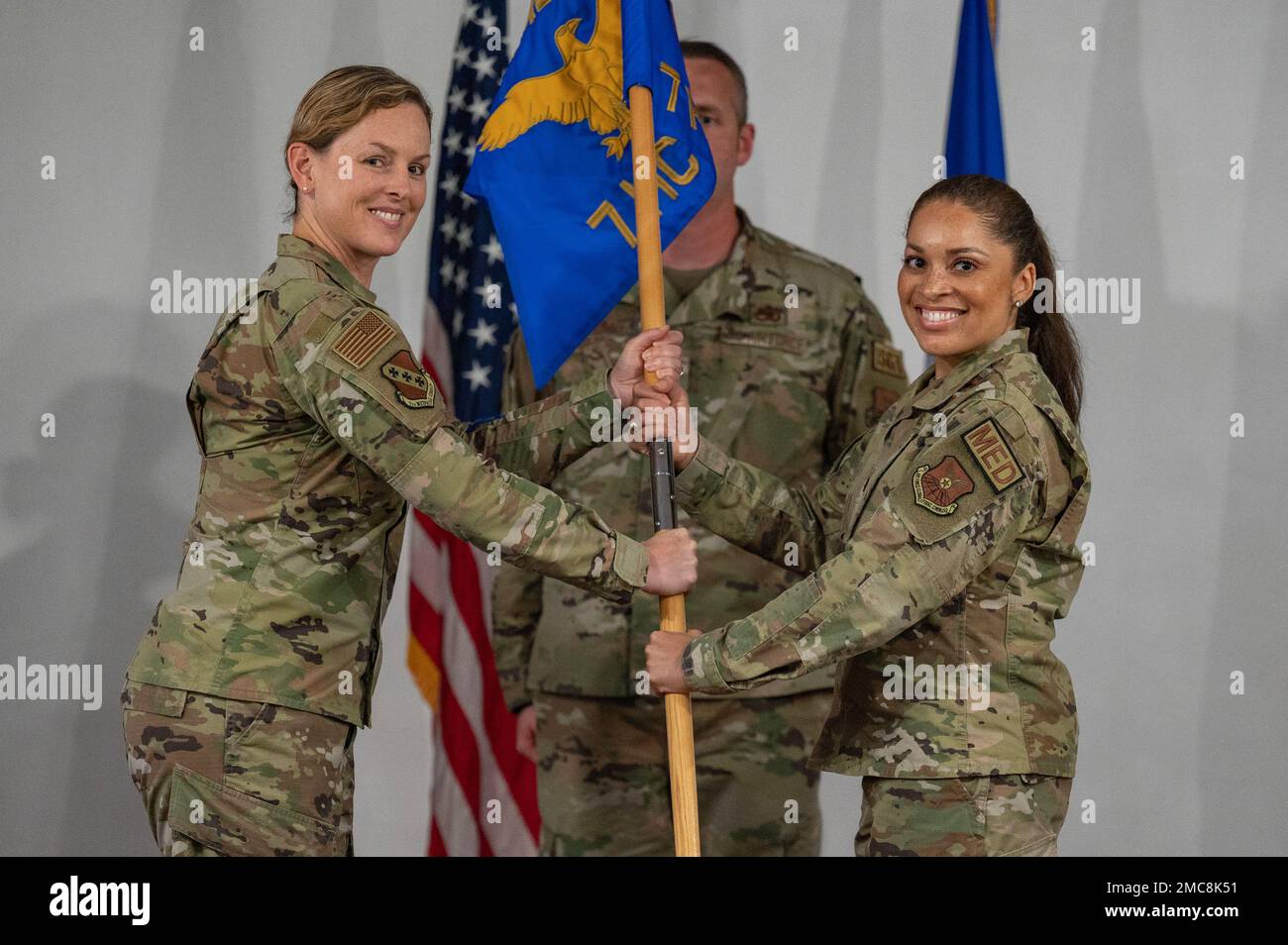 Col. Elizabeth Somsel, 7th Medical Group commander, passes the guidon ...