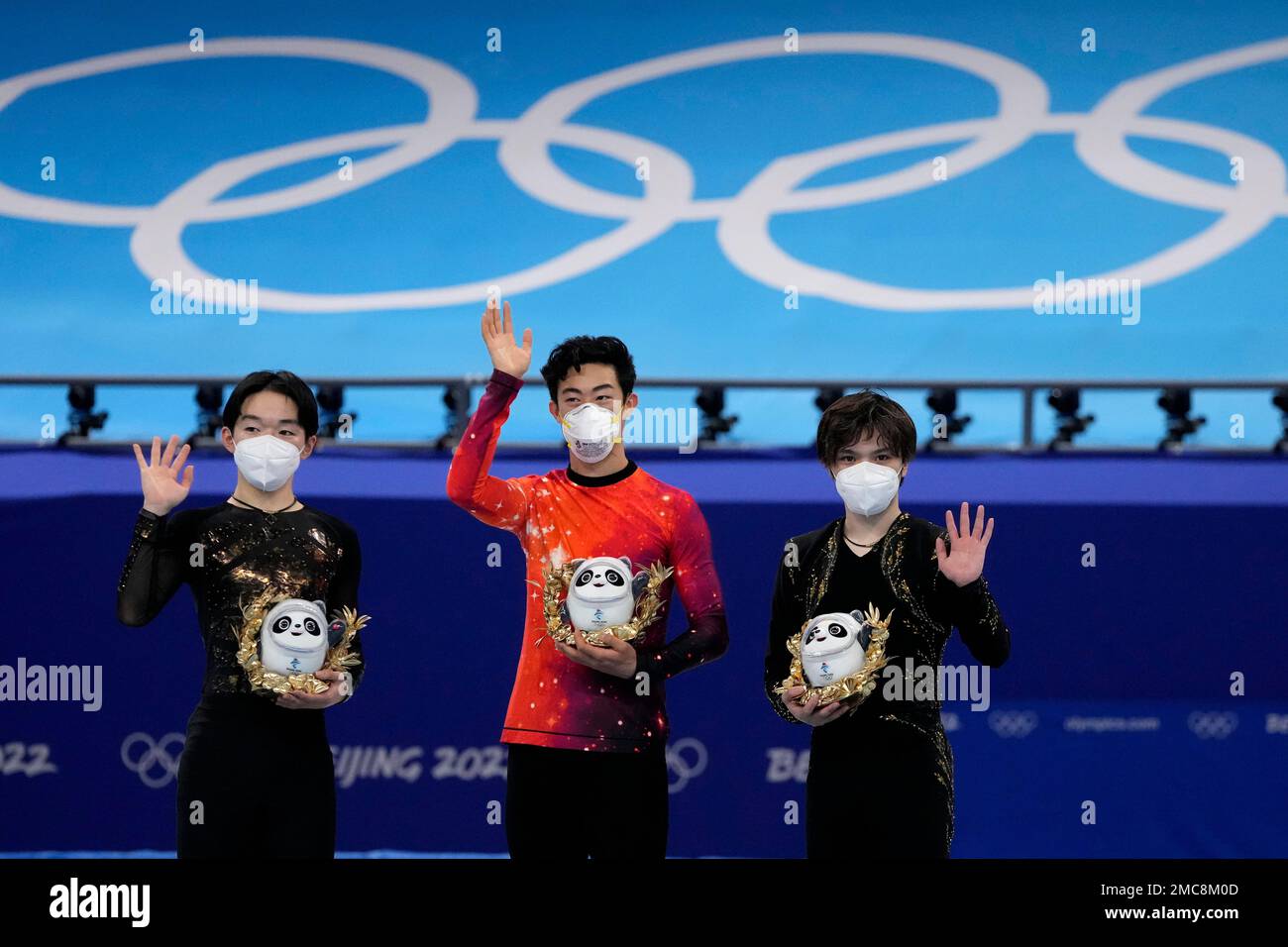 Gold medalist, Nathan Chen, of the United States, center, poses with ...