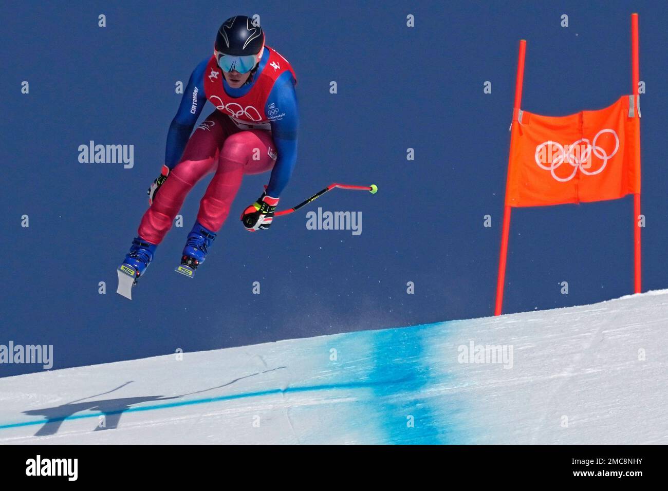 Marco Pfiffner, of Liechtenstein makes a jump during the downhill part ...