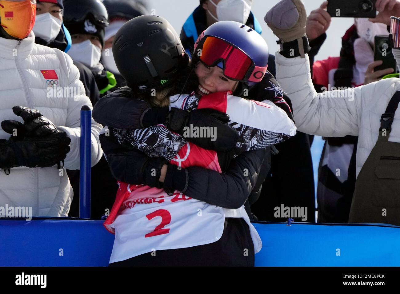 China's Eileen Gu hugs United States' Chloe Kim after Kim won a gold ...