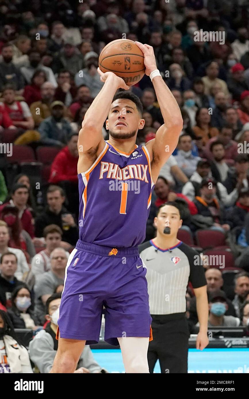 Phoenix Suns' Devin Booker shoots during the second half of an NBA ...