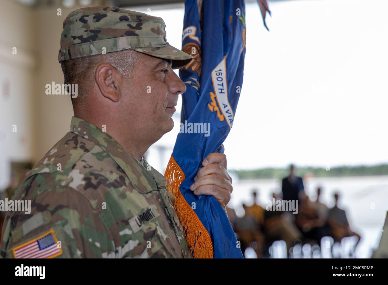 U.S. Army Col. Michael LaPoint, 57th Troop Brigade commander, passes ...
