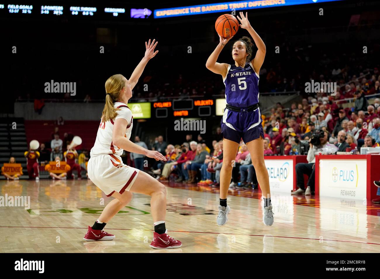 Kansas State guard Brylee Glenn (5) shoots over Iowa State guard Emily ...