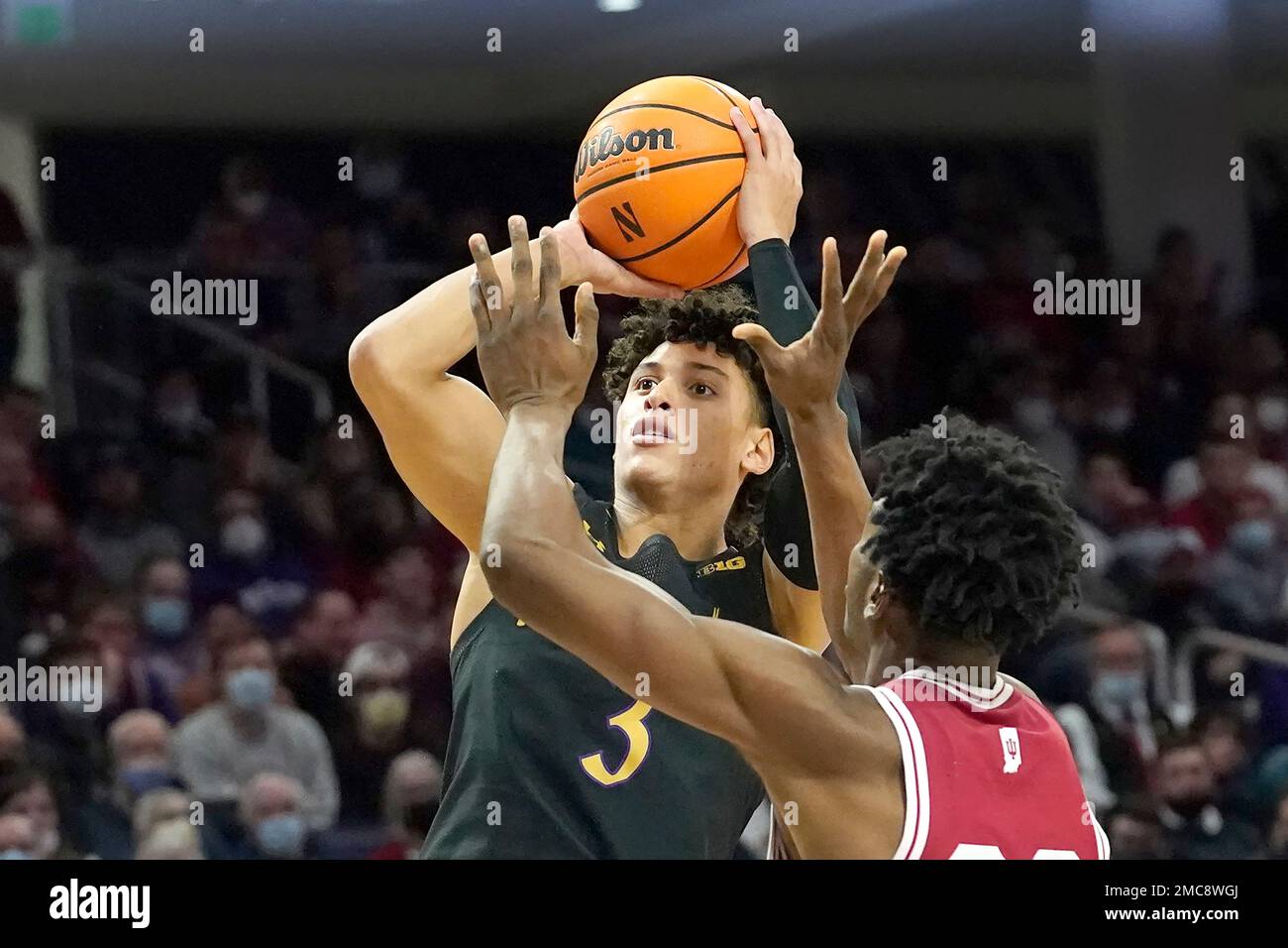 Northwestern's Ty Berry shoots during the second half of an NCAA ...