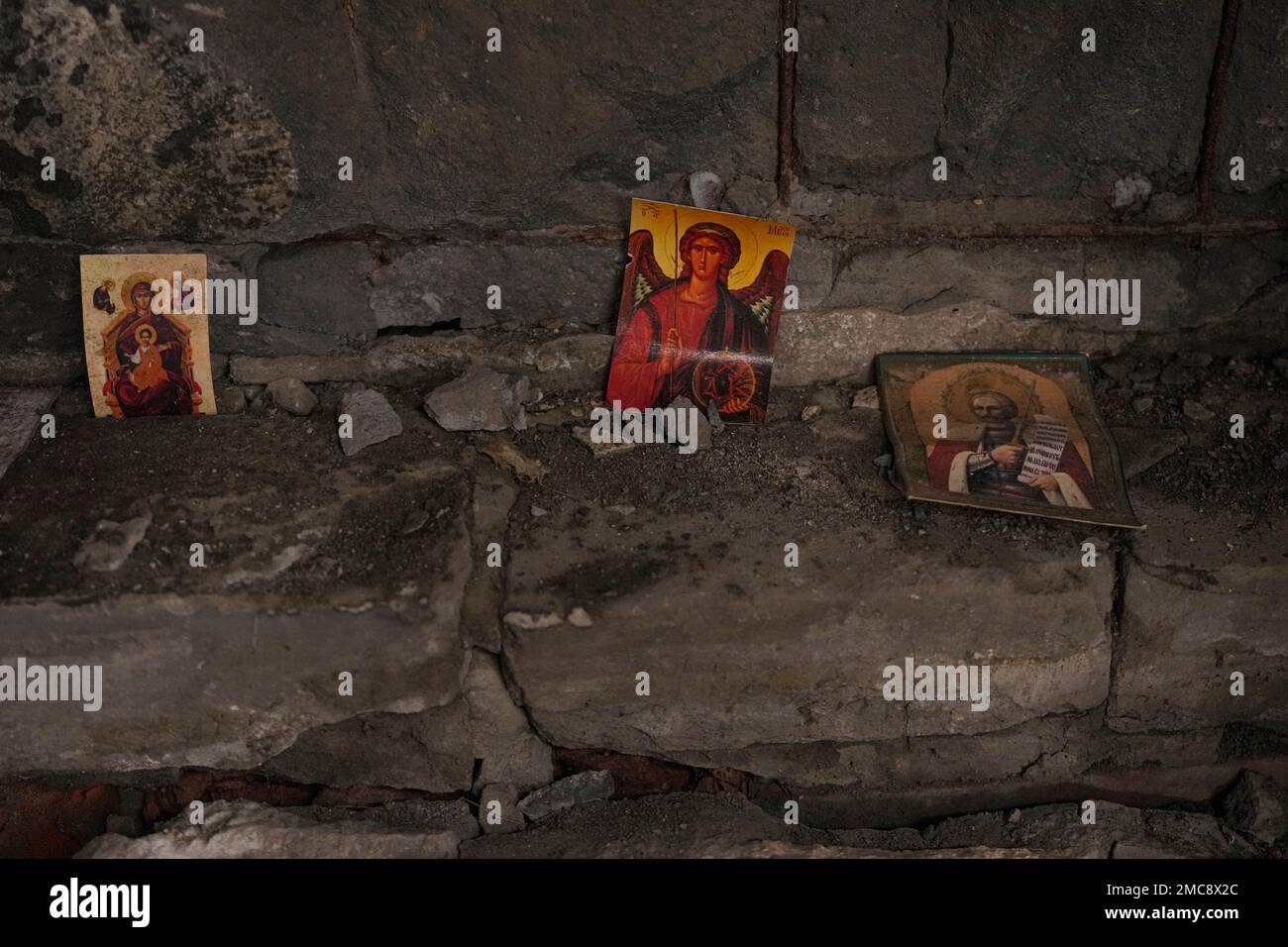 Religious icons are placed near a bunker on a frontline position ...