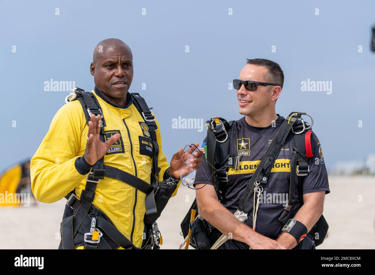 Sgt. 1st class Ryan Ries of the Golden Knights tandem team, stands next ...