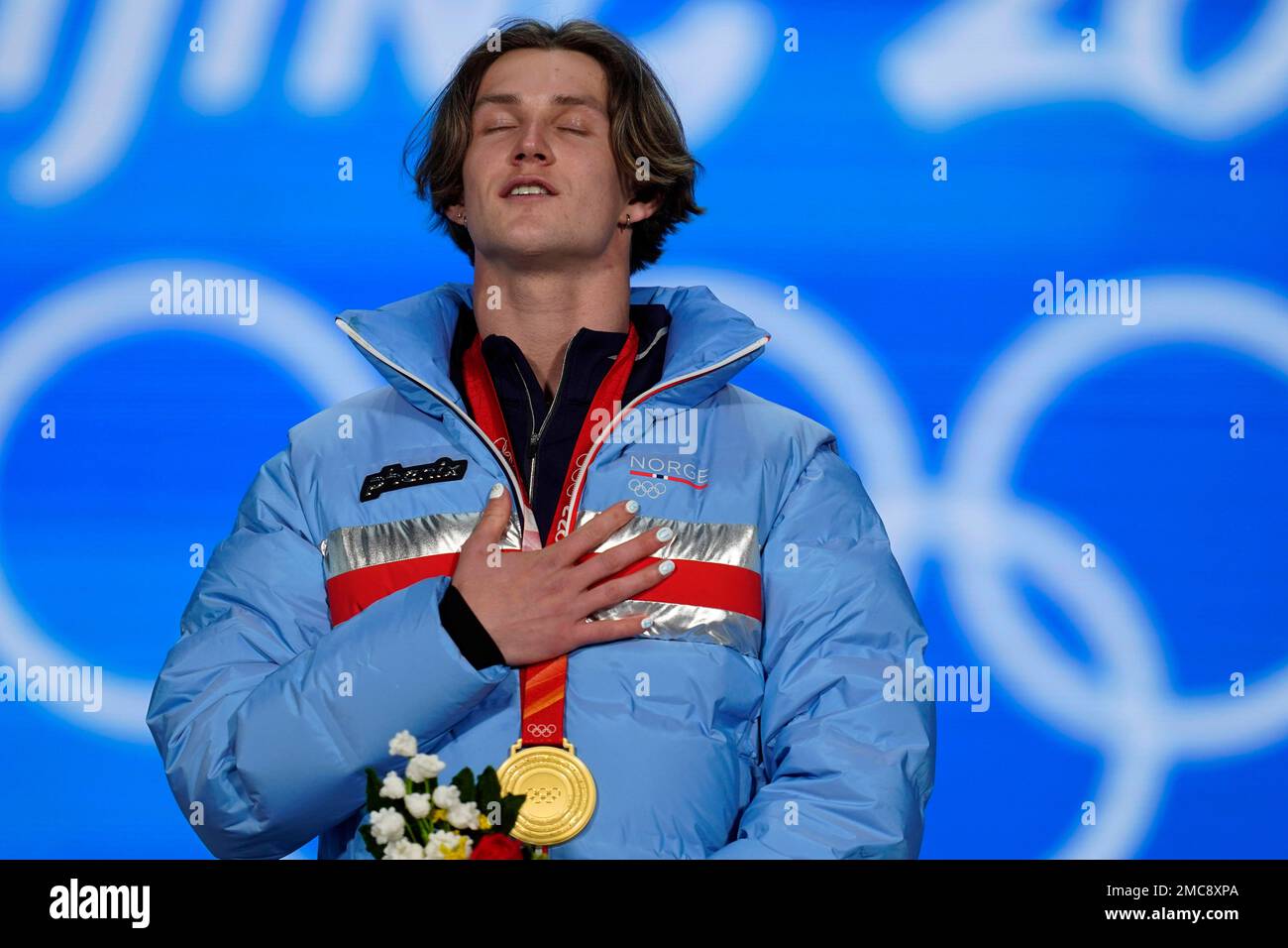Gold medalist Birk Ruud of Norway celebrates during the medal ceremony ...