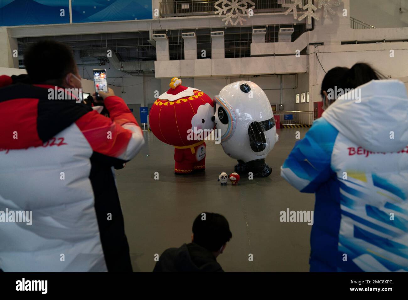 Inflated Winter Olympic and Paralympic mascots, Bing Dwen Dwen, center right, and Shuey Rhon ...