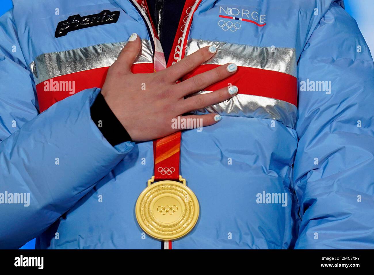 Gold medalist Birk Ruud of Norway celebrates during the medal ceremony ...