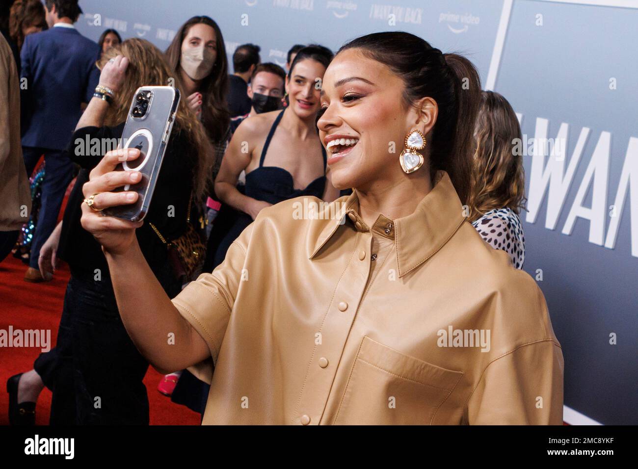 Gina Rodriguez broadcasts live on video for Amazon Prime as she arrives ...