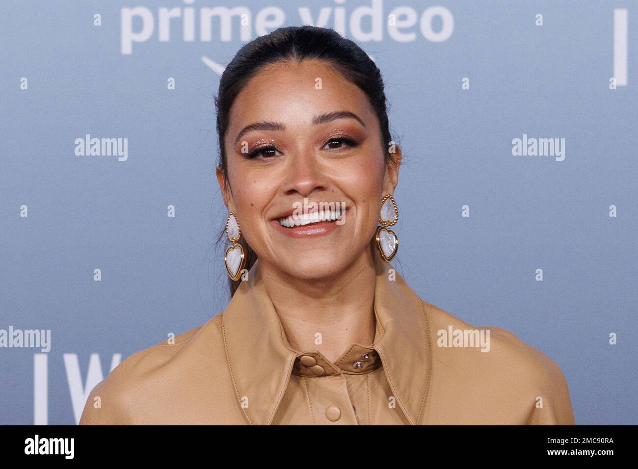 Gina Rodriguez arrives at the premiere of "I Want You Back" on Tuesday ...