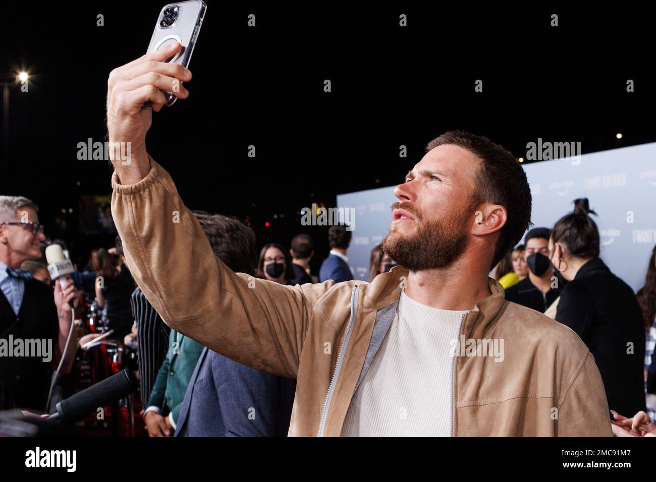 Scott Eastwood takes a selfie during an interview for TV at the ...