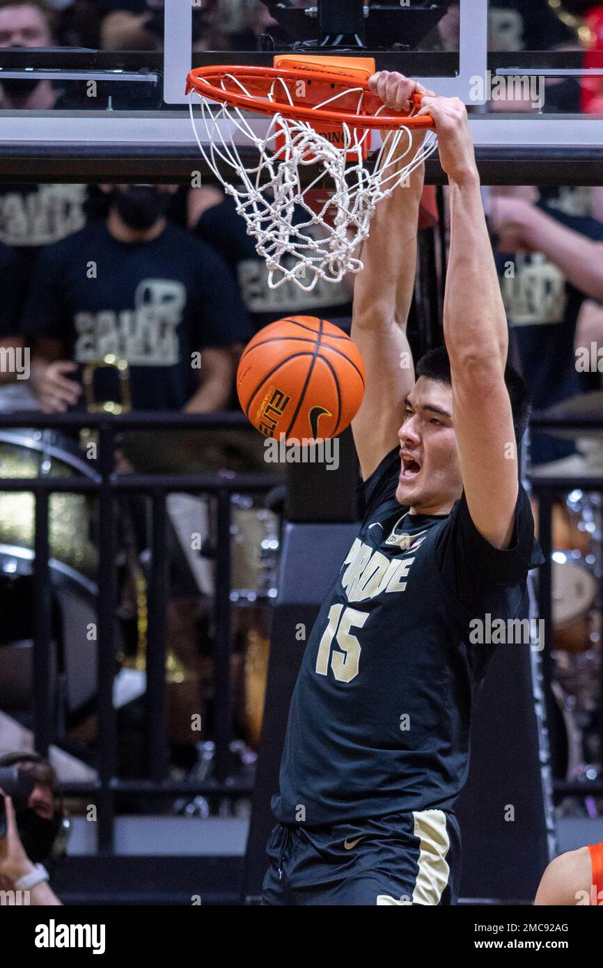 Purdue center Zach Edey (15) dunks during the first half of an NCAA ...