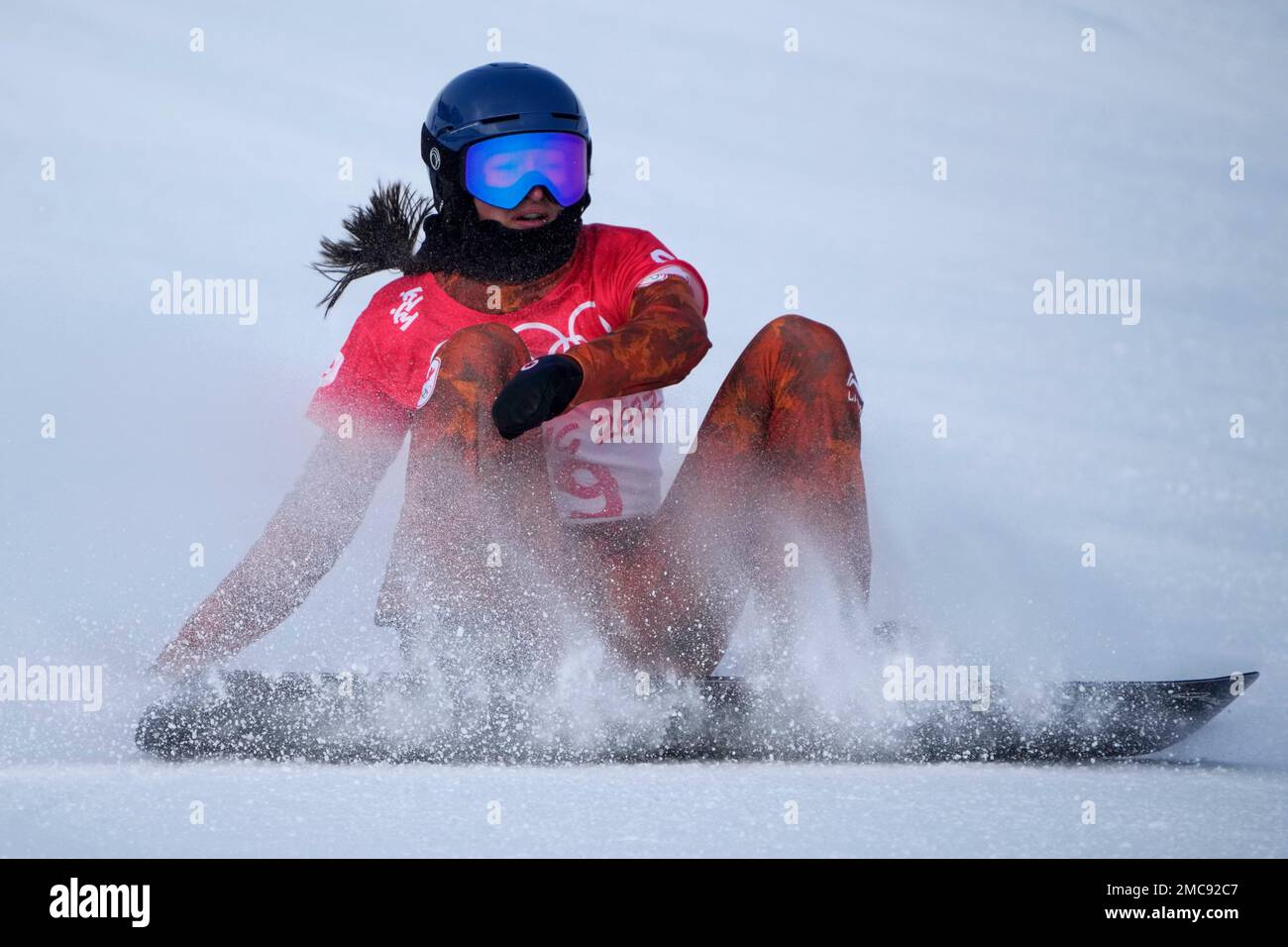 Canada's Tess Critchlow competes during the women's snowboard cross ...