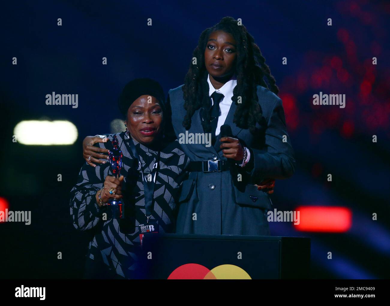 Little Simz on stage with her mum after winning the award for best new ...