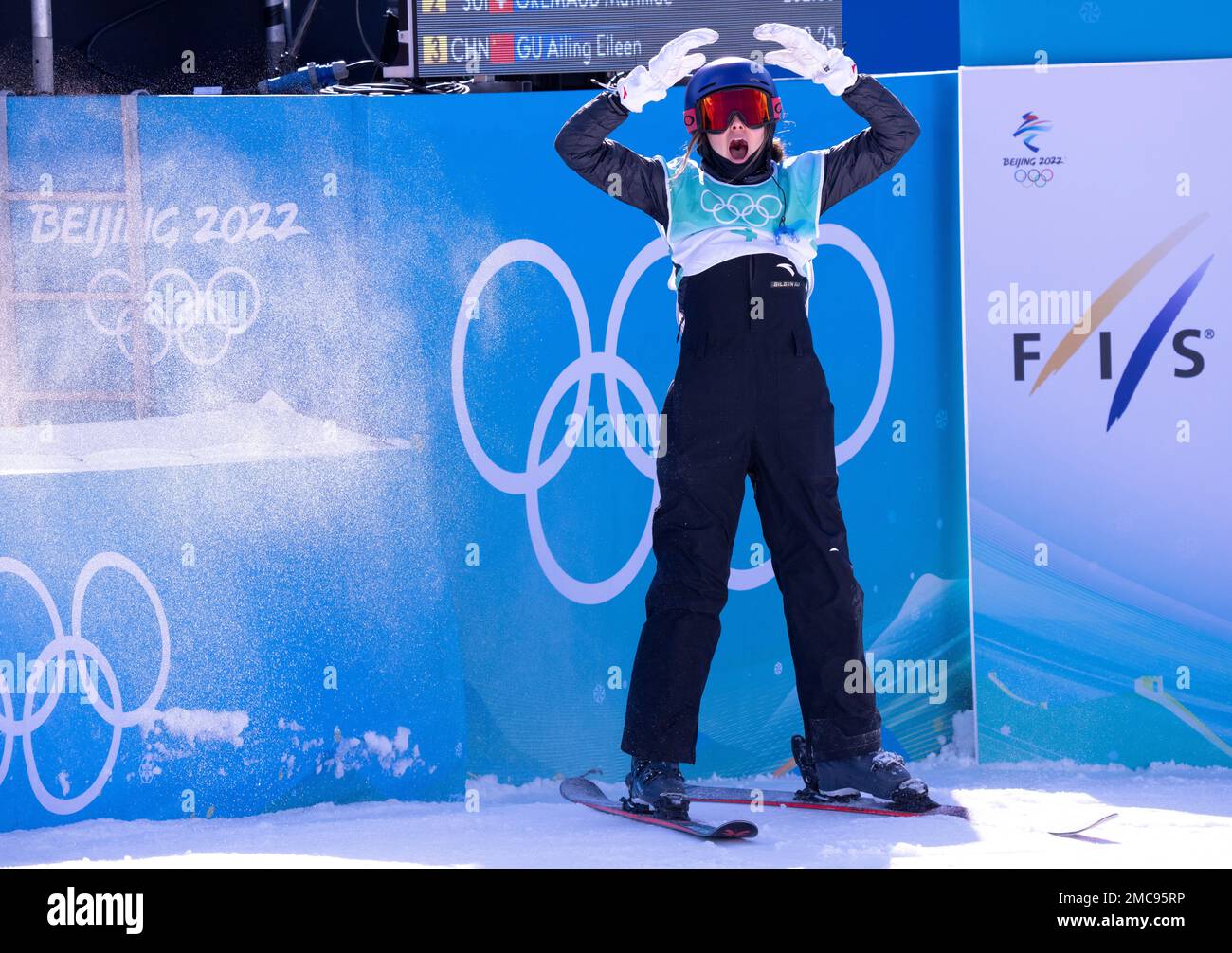 Ailing Eileen Gu from China reacts at the end of her third run to go on ...