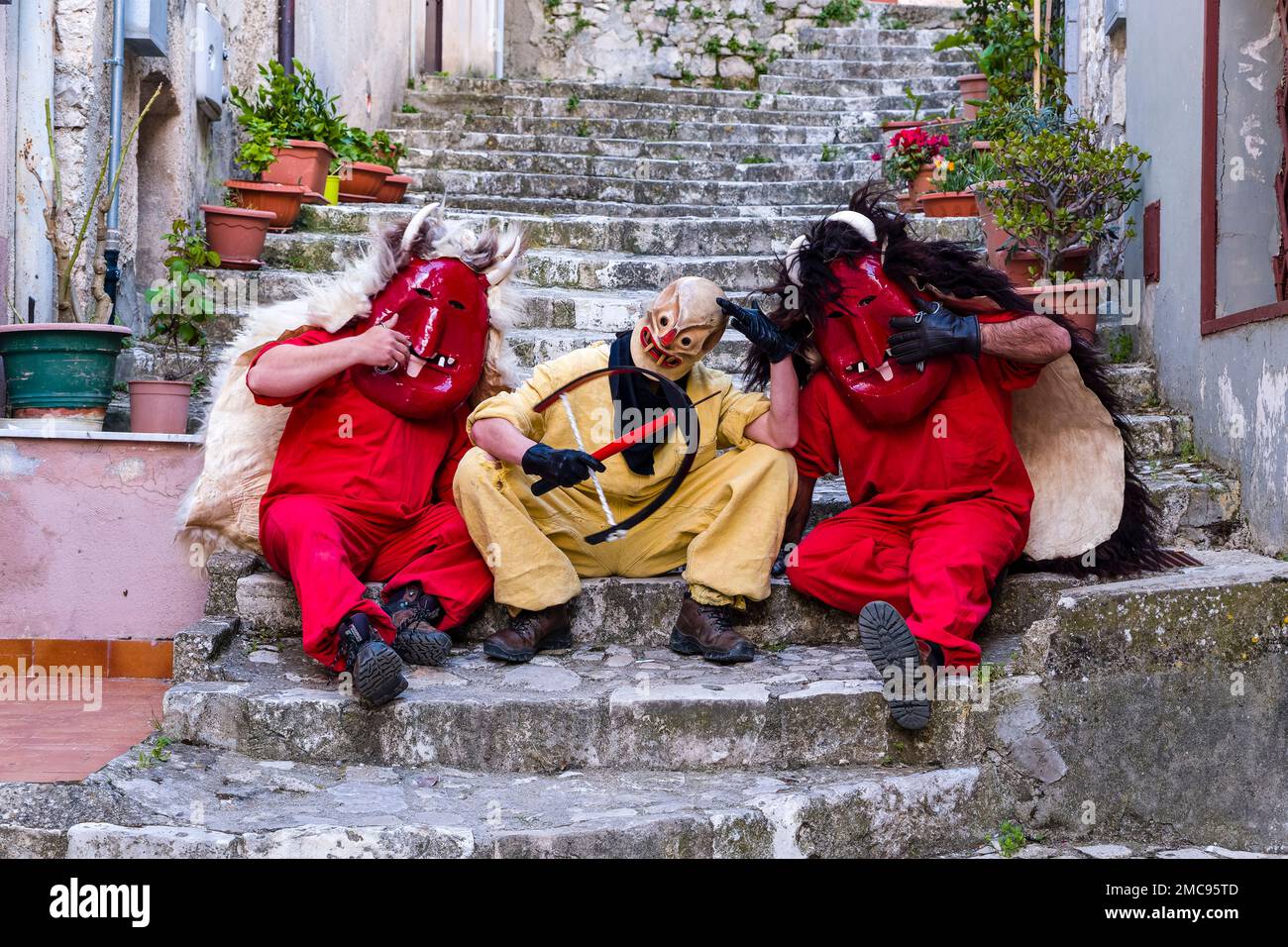 The figures of the devil and death dance through the streets during the ...