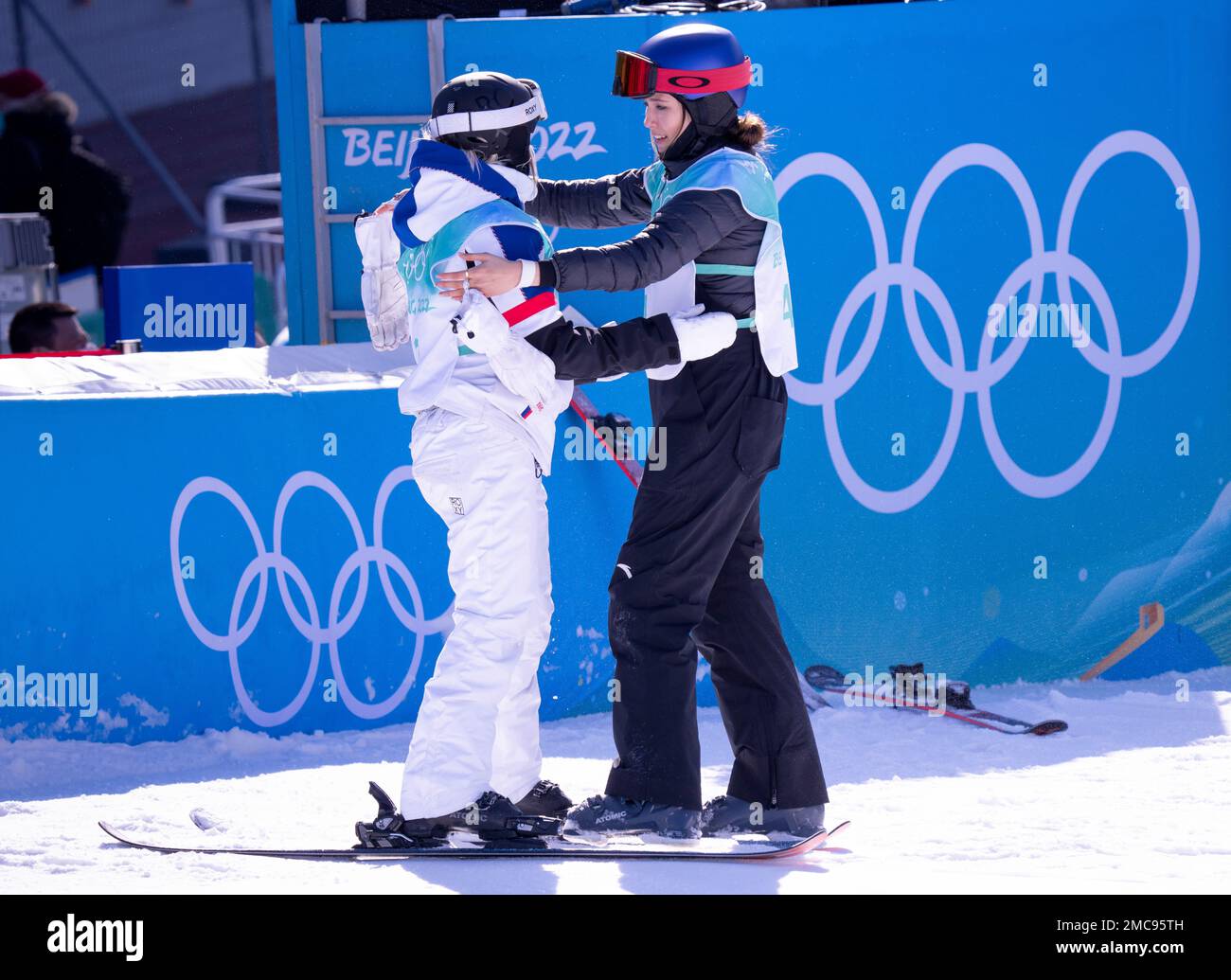Gold medalist Ailing Eileen Gu, right, from China hugs silver medalist ...