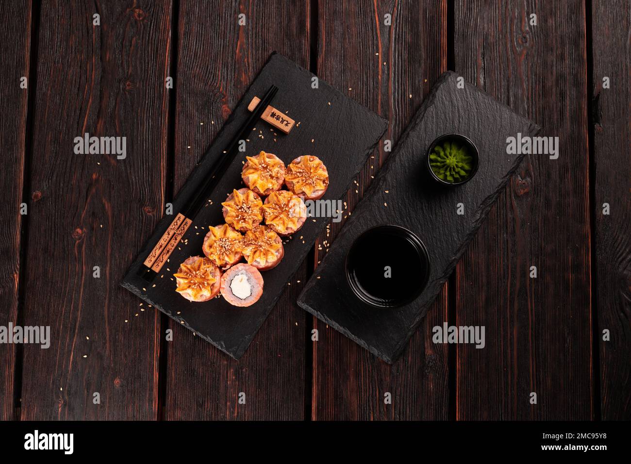 Sushi roll philadelphia with salmon and cream cheese on black ...