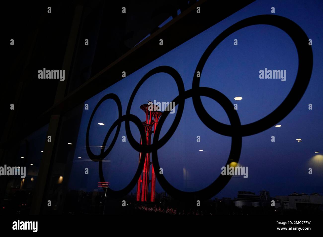 The Beijing Olympic Tower is displayed inside the Olympic rings at the ...