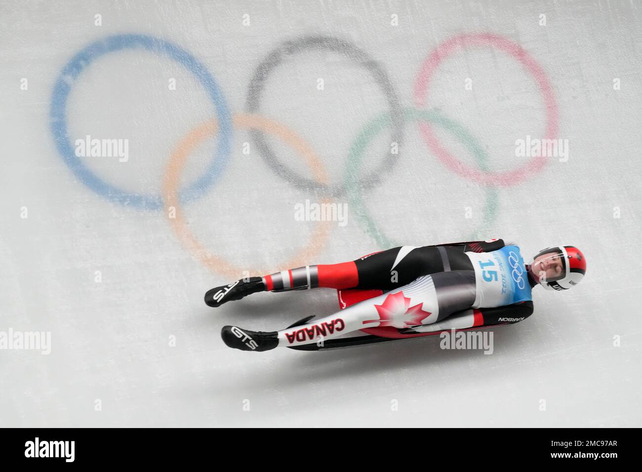 Trinity Ellis, of Canada, slides during the luge women's singles run 3 ...