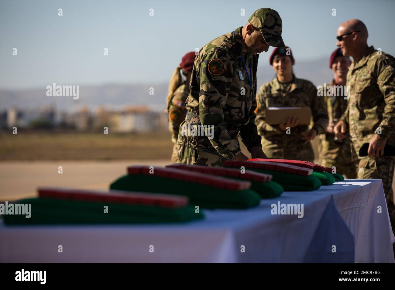 A Moroccan Soldier prepares to hand out Moroccan parachutist and ...