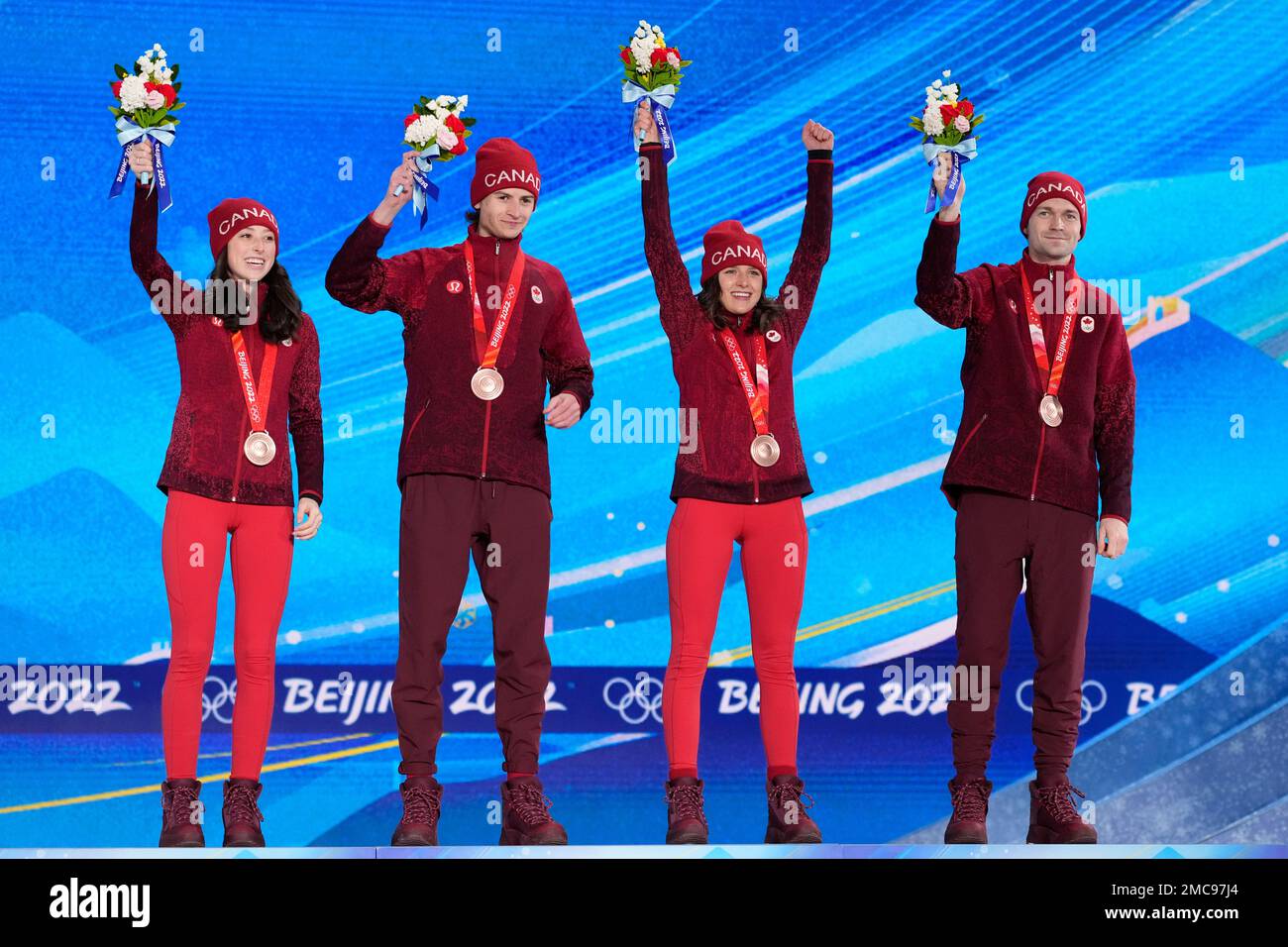Canada's Alexandria Loutitt, left, poses with teammates Matthew Soukup ...