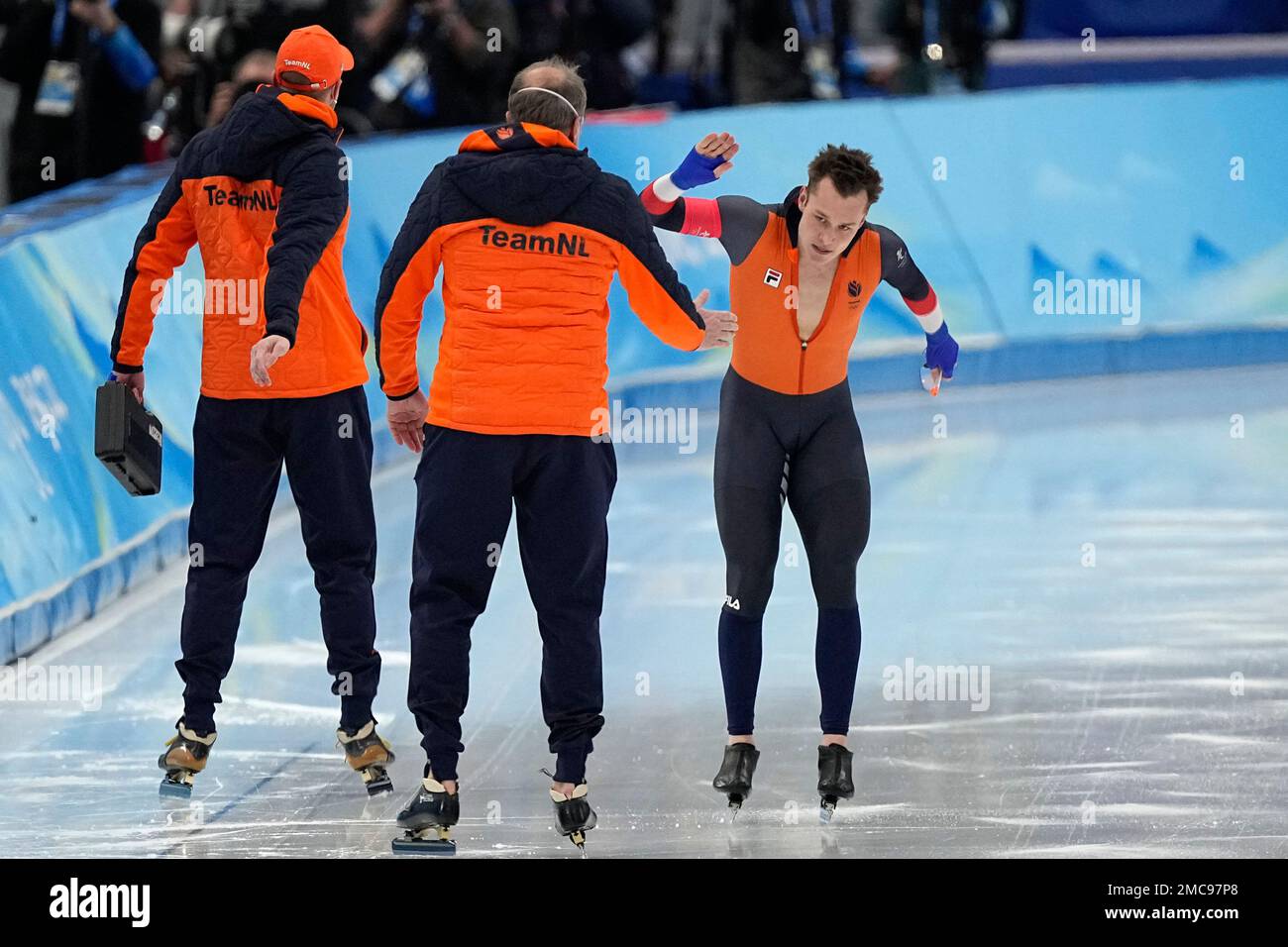 Marcel Bosker of the Netherlands celebrates with coaches after ...