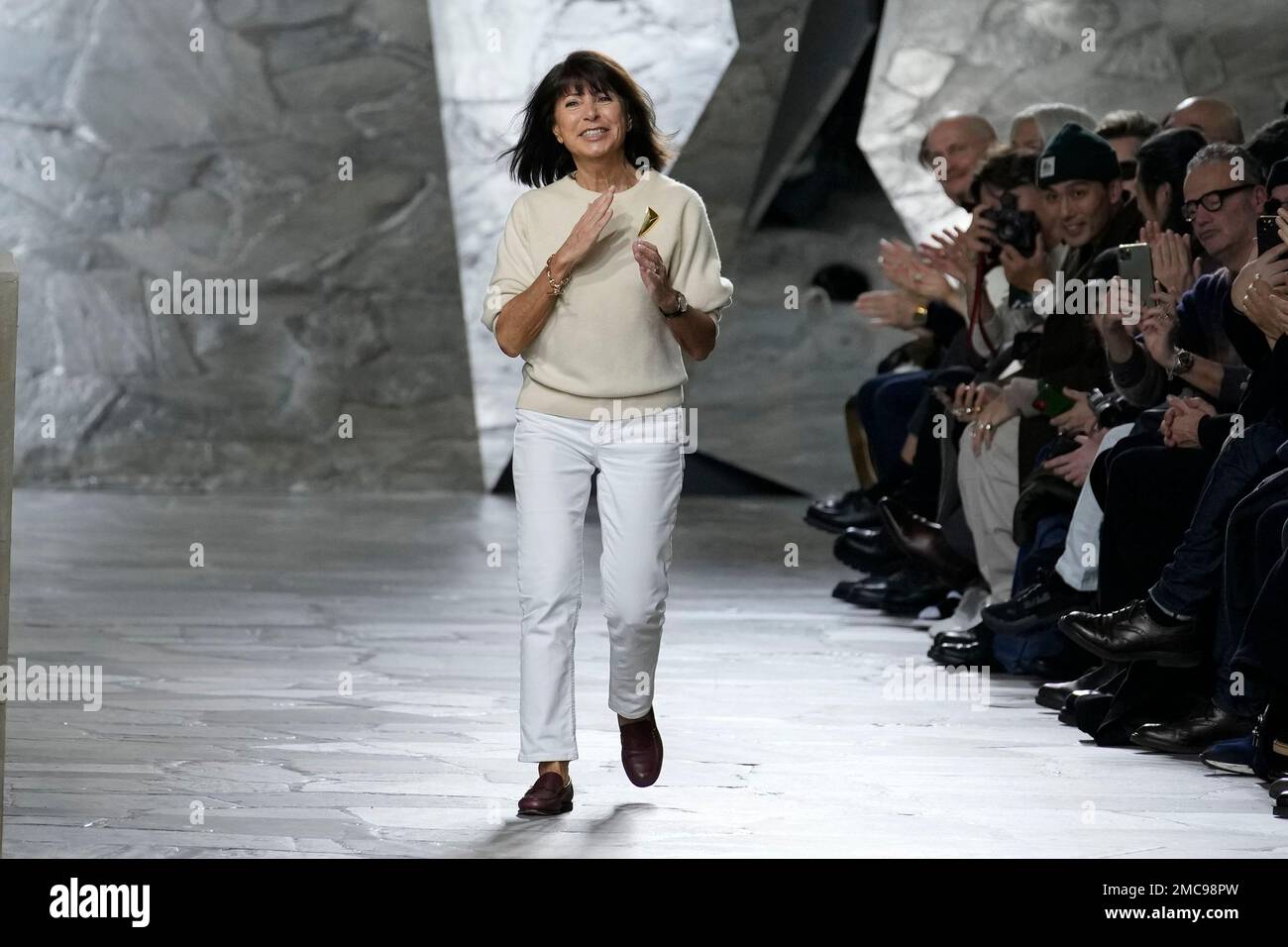 Designer Veronique Nichanian accepts applause at the end of the Hermes ...