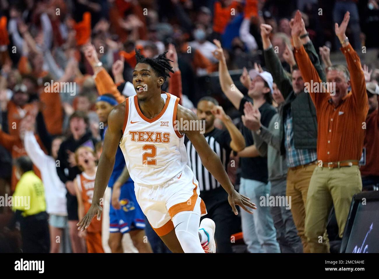 Texas guard Marcus Carr (2) celebrates after making a basket at the end ...