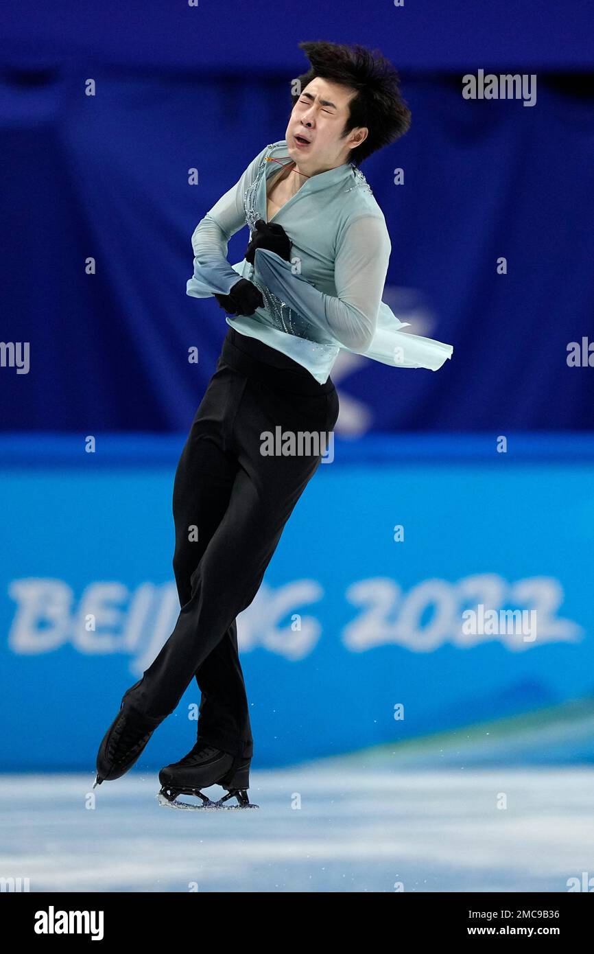Jin Boyang, of China, competes during the men's short program figure ...